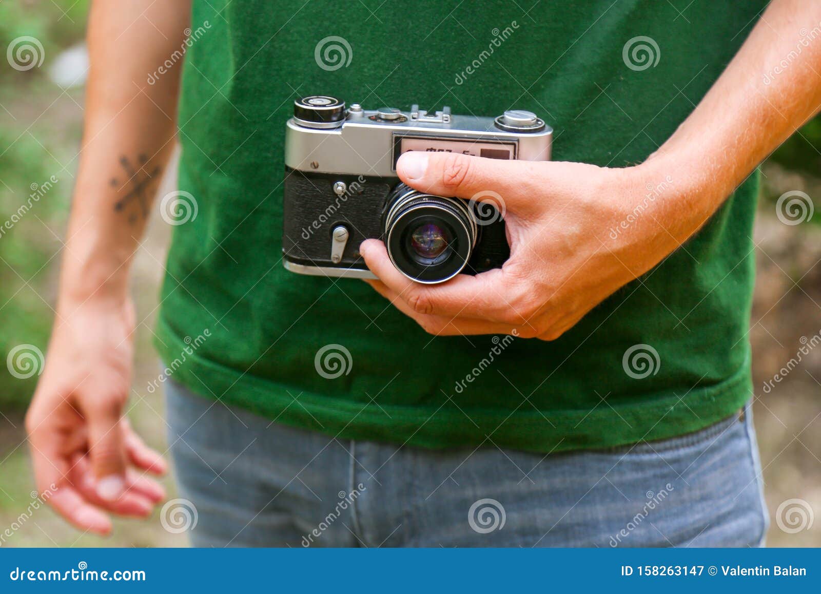 Man with Old Camera in a Hand. Stock Image - Image of looking, holding ...