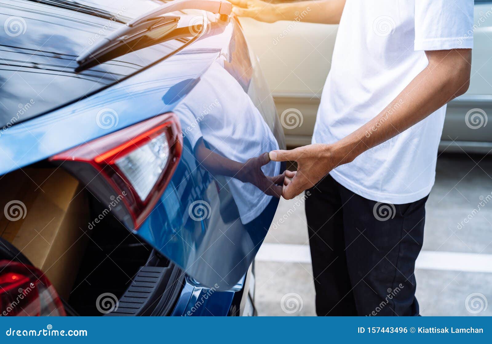 Man Open Hatchback Car for Trunk Cardboard Box Parcel Delivery ...