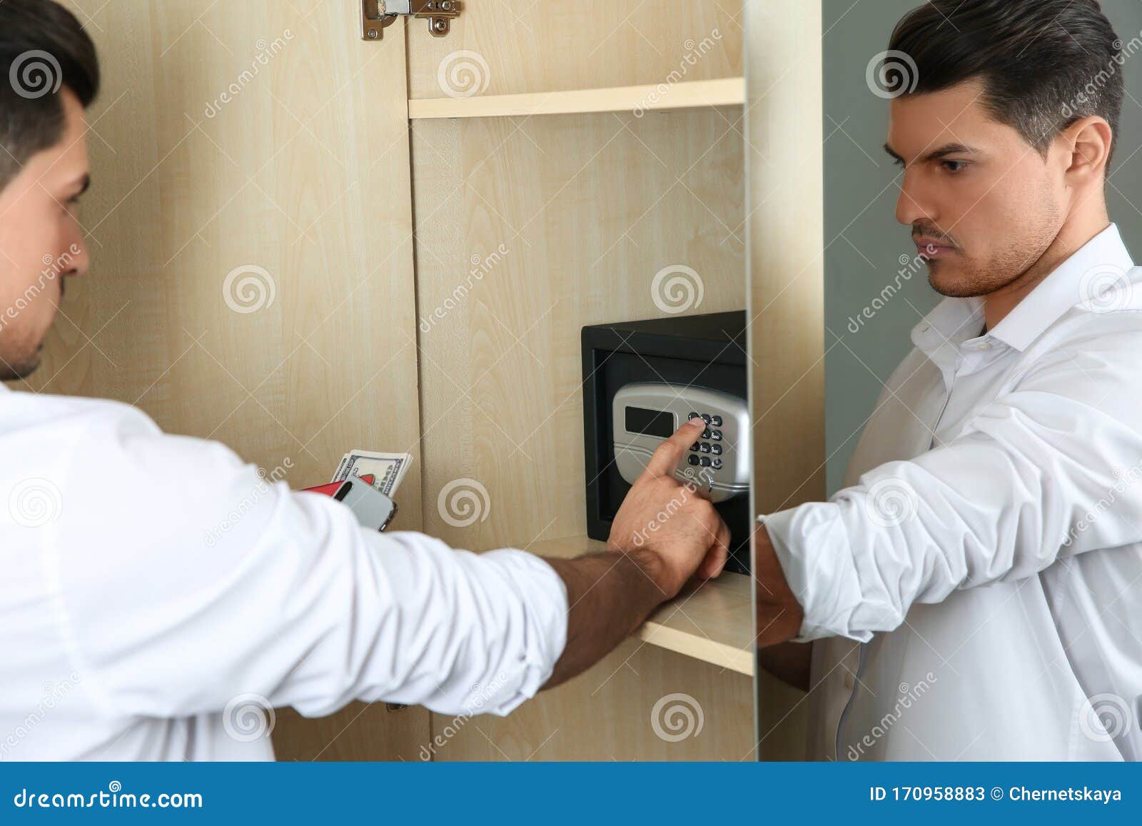Man Opening Black Steel Safe with Electronic Lock Stock Image - Image ...