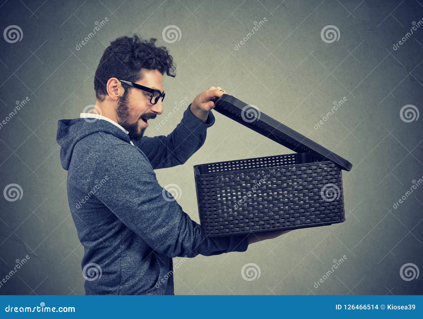 Man Opening a Box with Something Exciting Inside it Stock Photo - Image ...