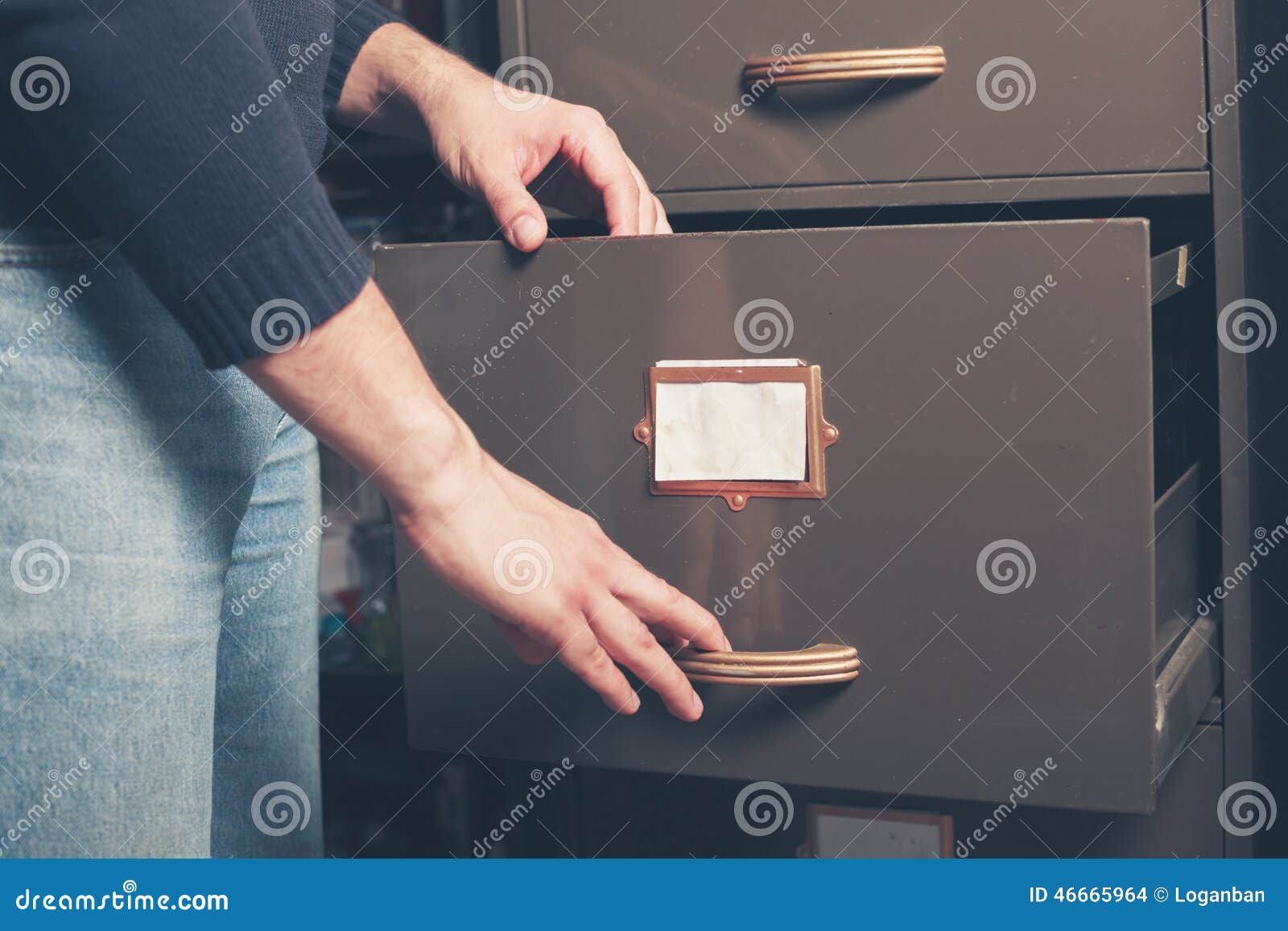Man opening file cabinet stock photo. Image of file, worker - 46665964