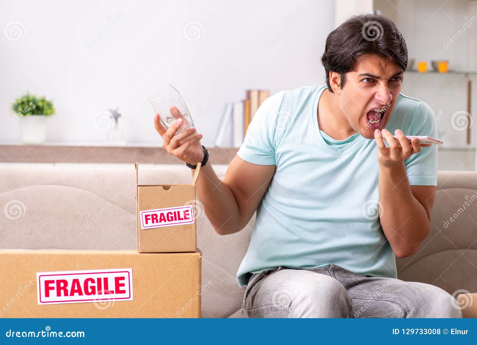 The Man Opening Fragile Parcel Ordered from Internet Stock Photo ...