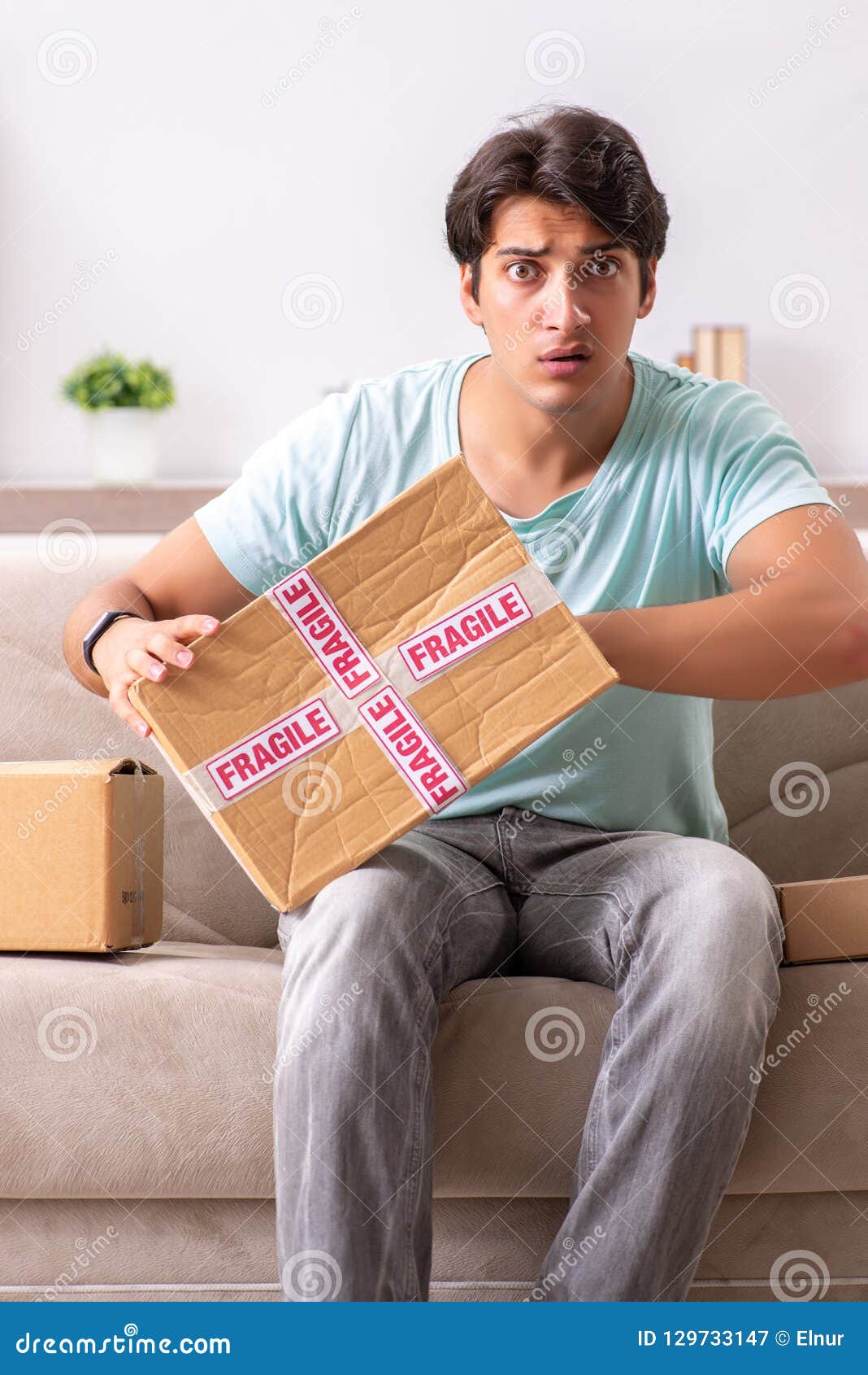 The Man Opening Fragile Parcel Ordered from Internet Stock Image ...