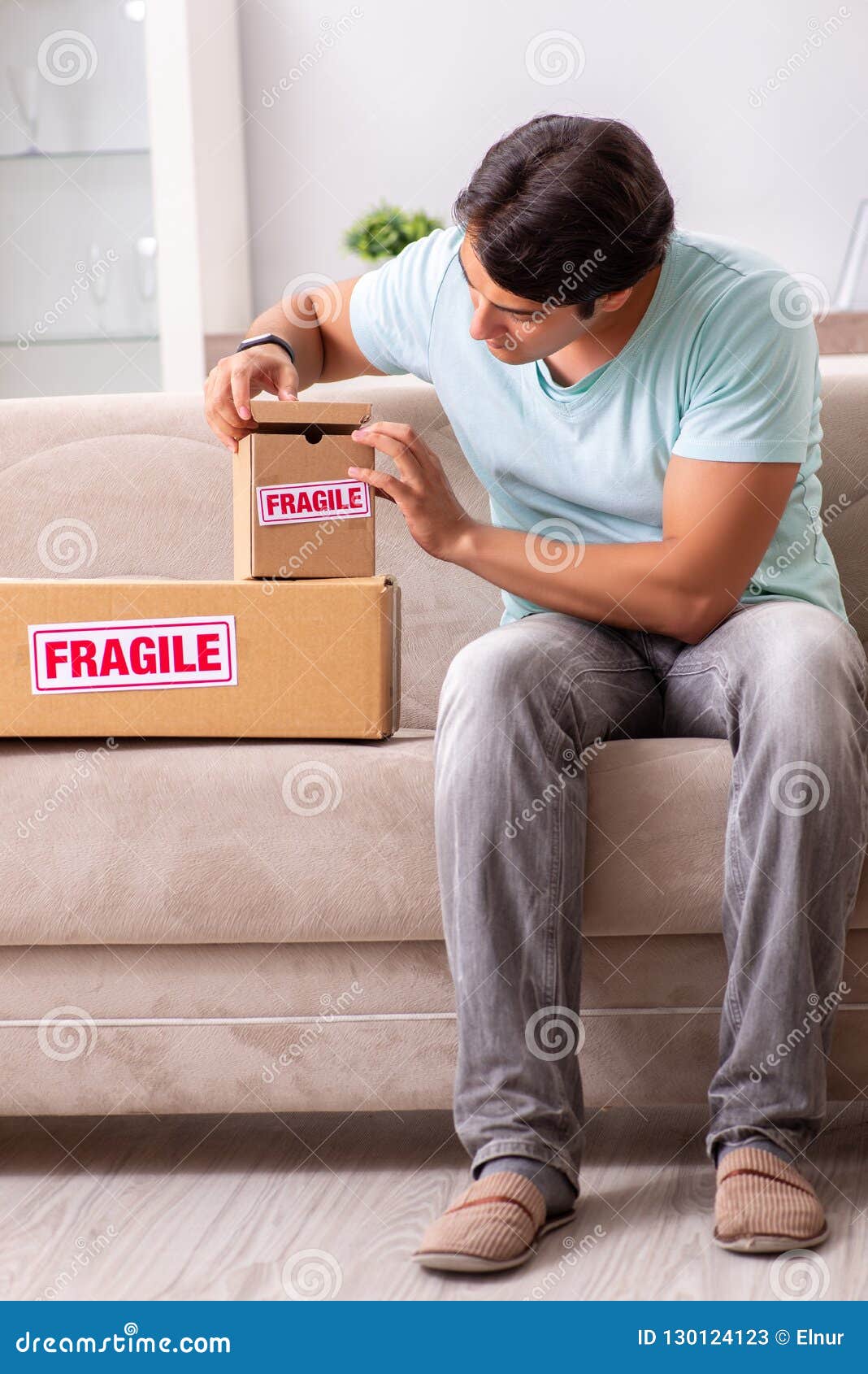 The Man Opening Fragile Parcel Ordered from Internet Stock Image ...