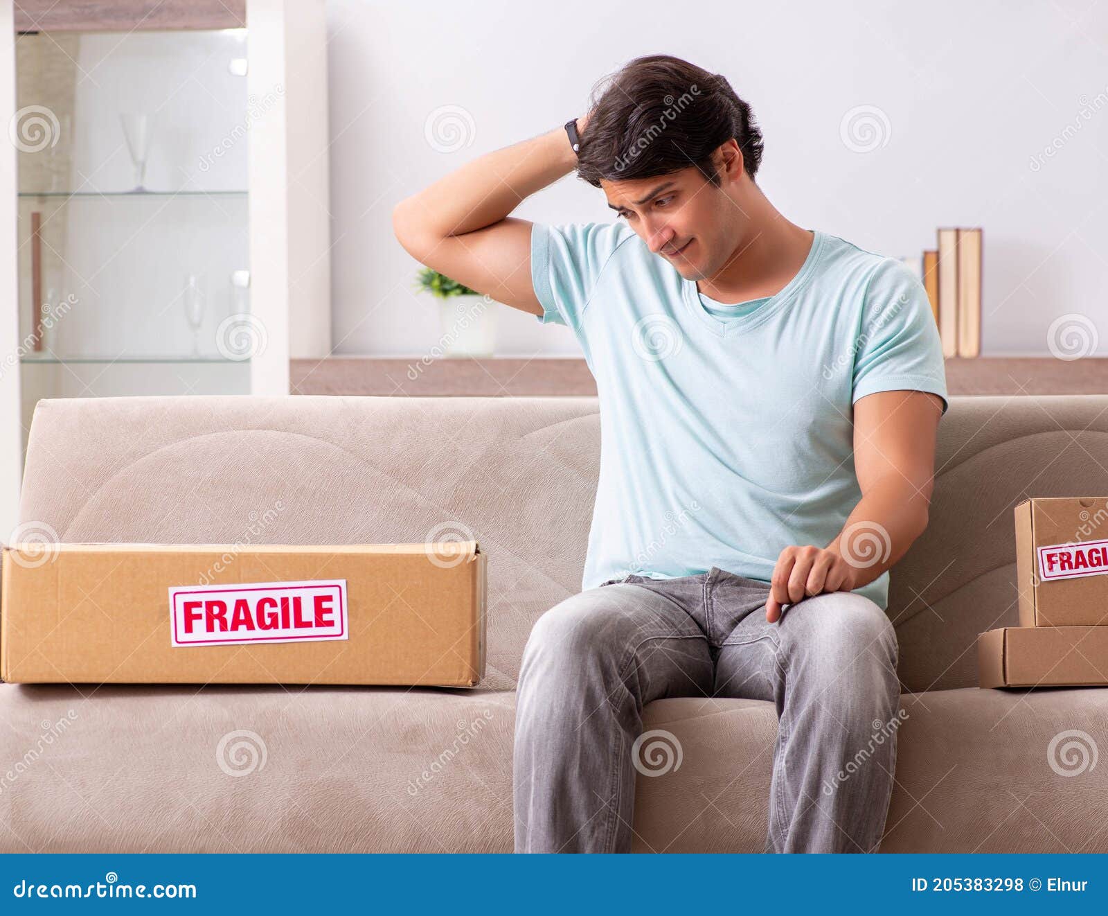 Man Opening Fragile Parcel Ordered from Internet Stock Photo - Image of ...