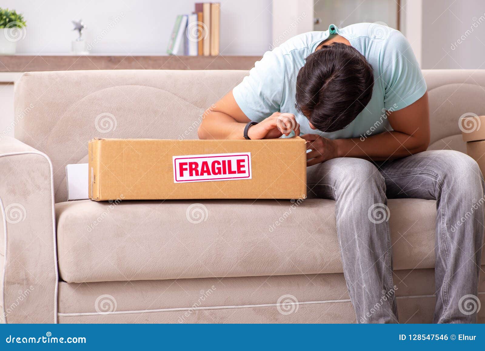 The Man Opening Fragile Parcel Ordered from Internet Stock Photo ...