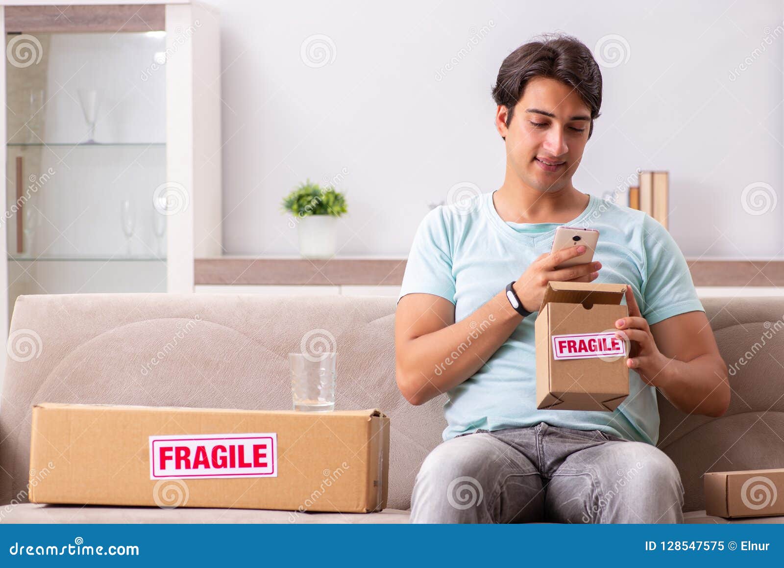 The Man Opening Fragile Parcel Ordered from Internet Stock Image ...