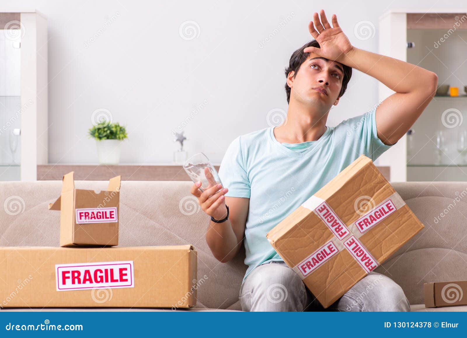 The Man Opening Fragile Parcel Ordered from Internet Stock Photo ...