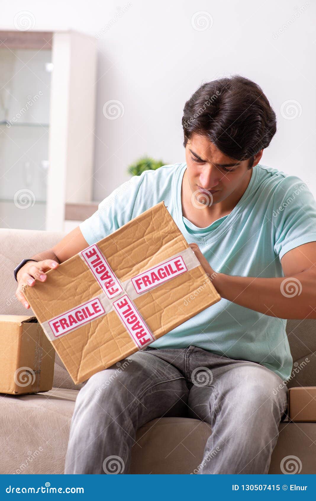 The Man Opening Fragile Parcel Ordered from Internet Stock Image ...