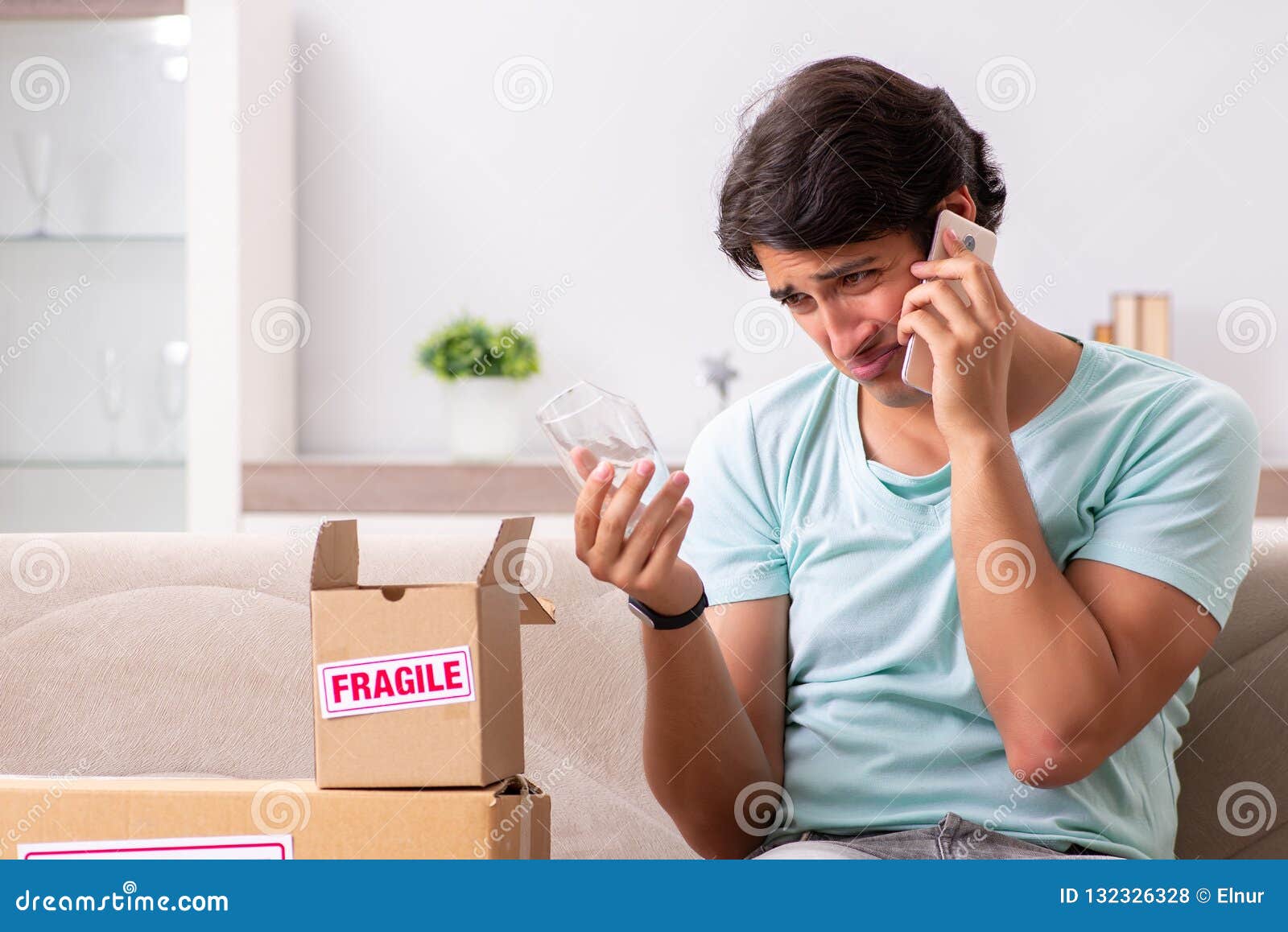 The Man Opening Fragile Parcel Ordered from Internet Stock Photo ...