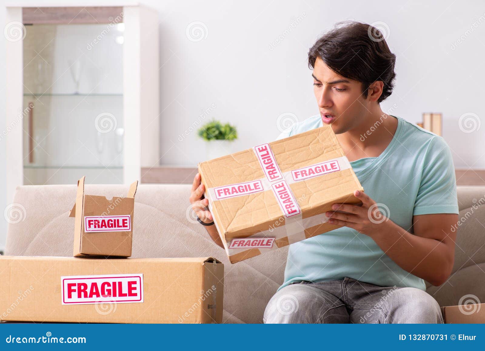 The Man Opening Fragile Parcel Ordered from Internet Stock Image ...