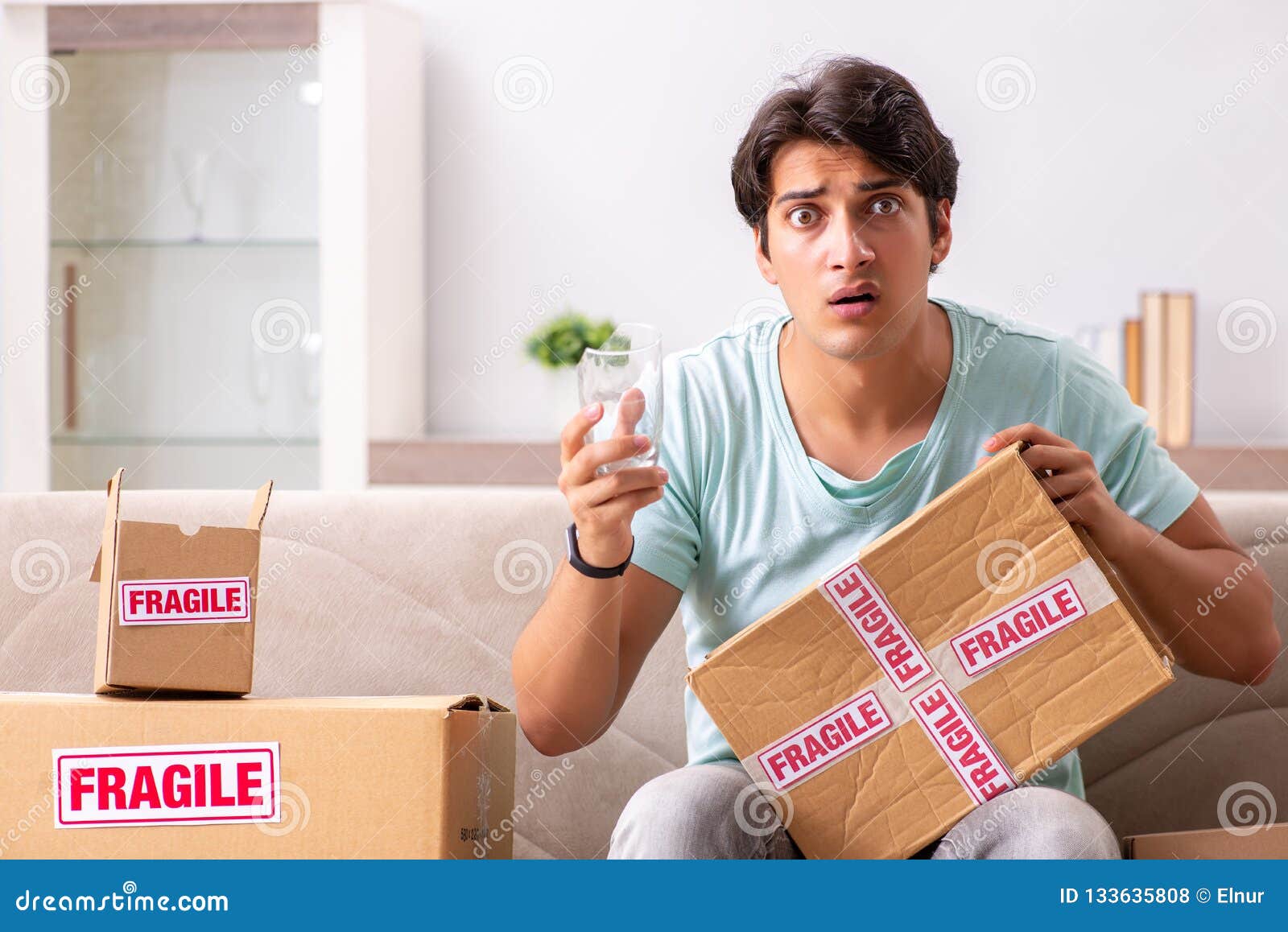 The Man Opening Fragile Parcel Ordered from Internet Stock Photo ...