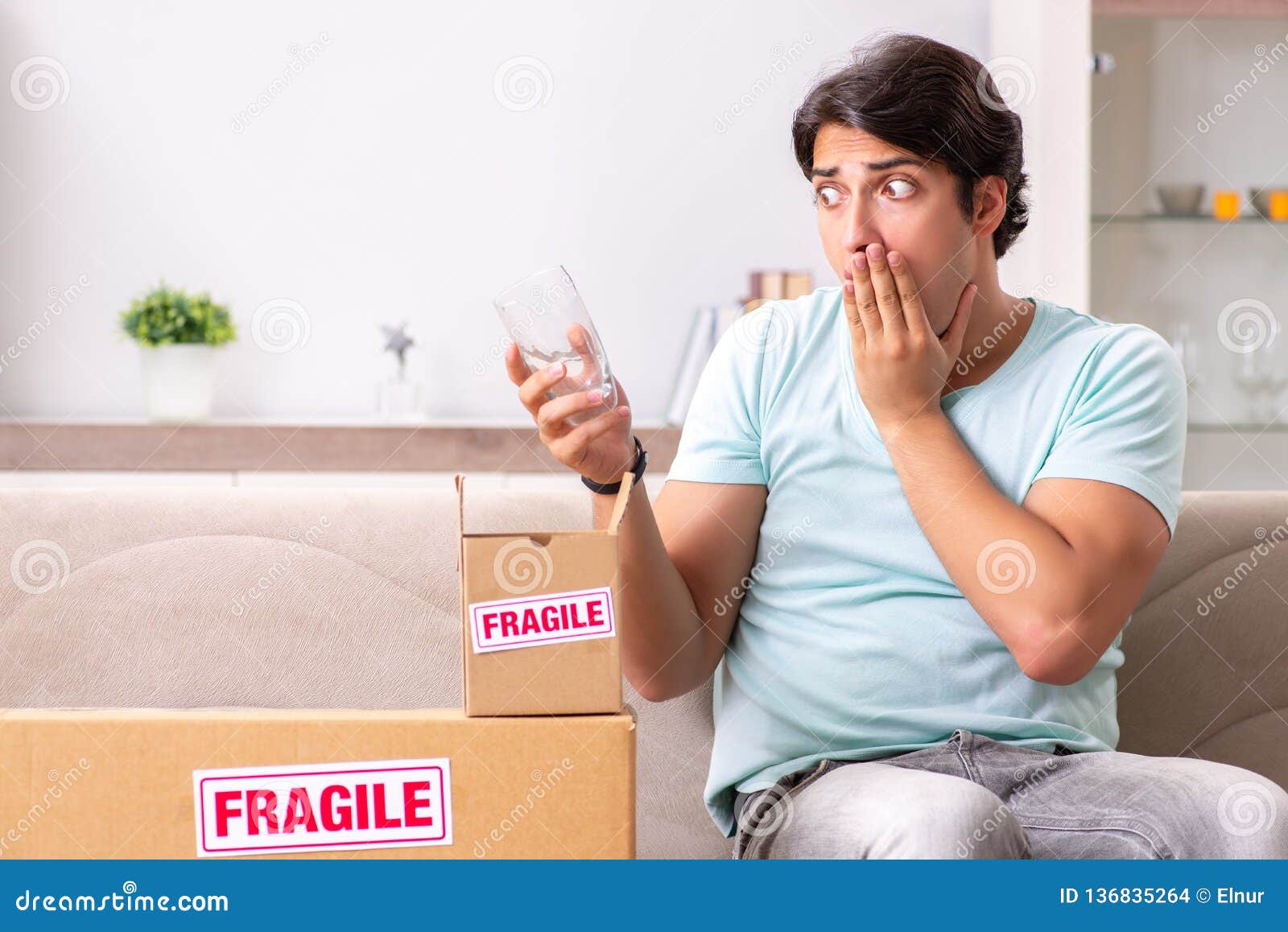 The Man Opening Fragile Parcel Ordered from Internet Stock Photo ...