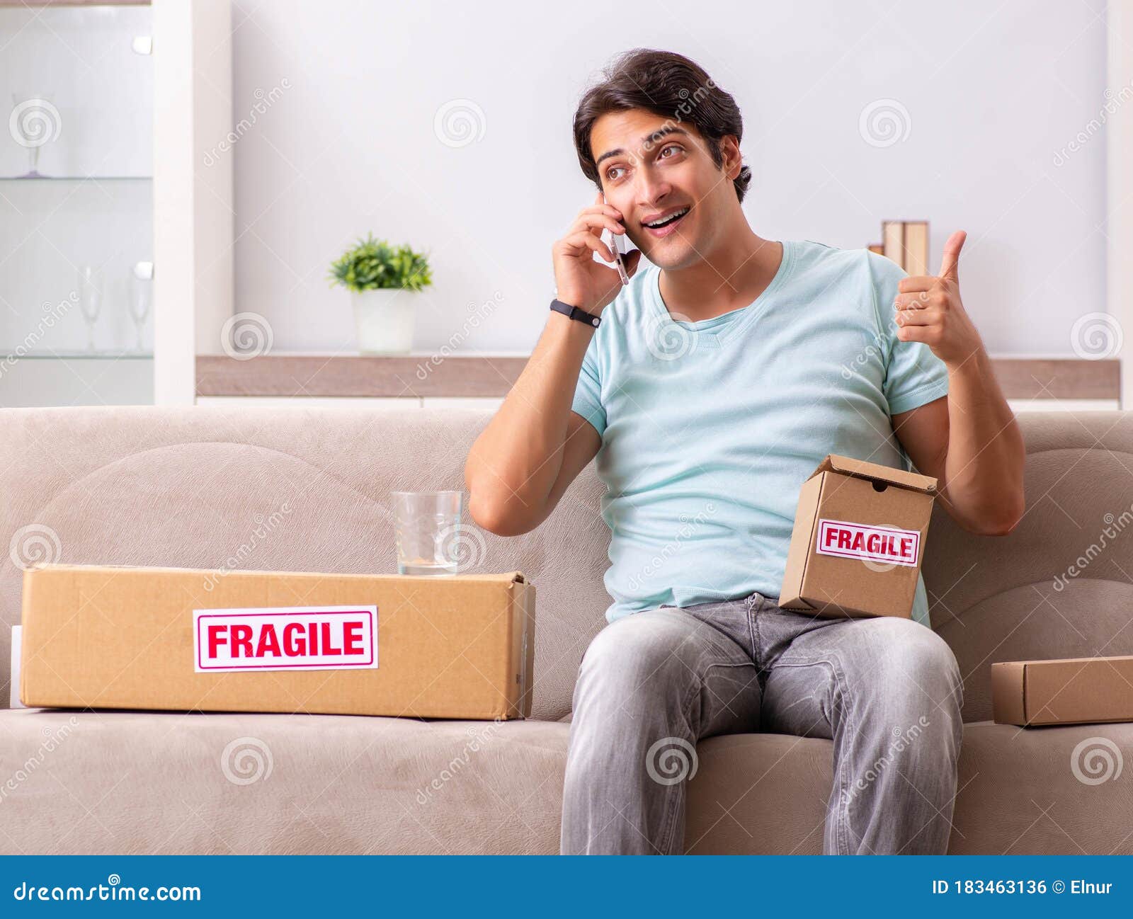 Man Opening Fragile Parcel Ordered from Internet Stock Photo - Image of ...