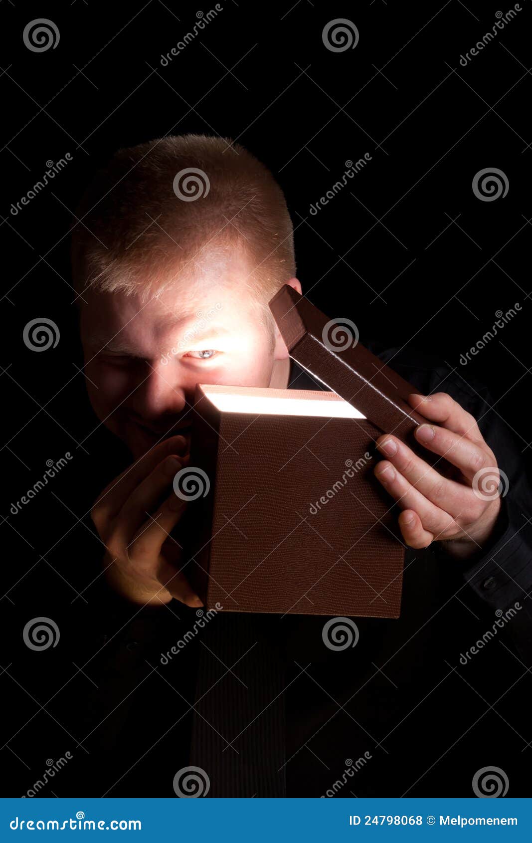 Man Opening a Gift Box stock photo. Image of face, expression - 24798068