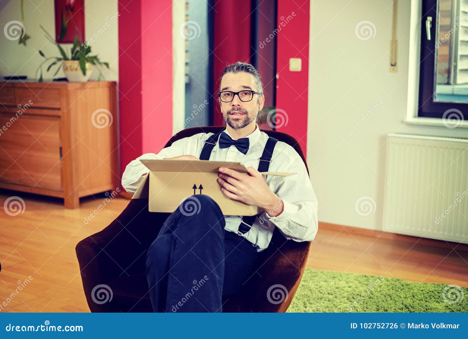 Man opening a package stock photo. Image of surprise - 102752726