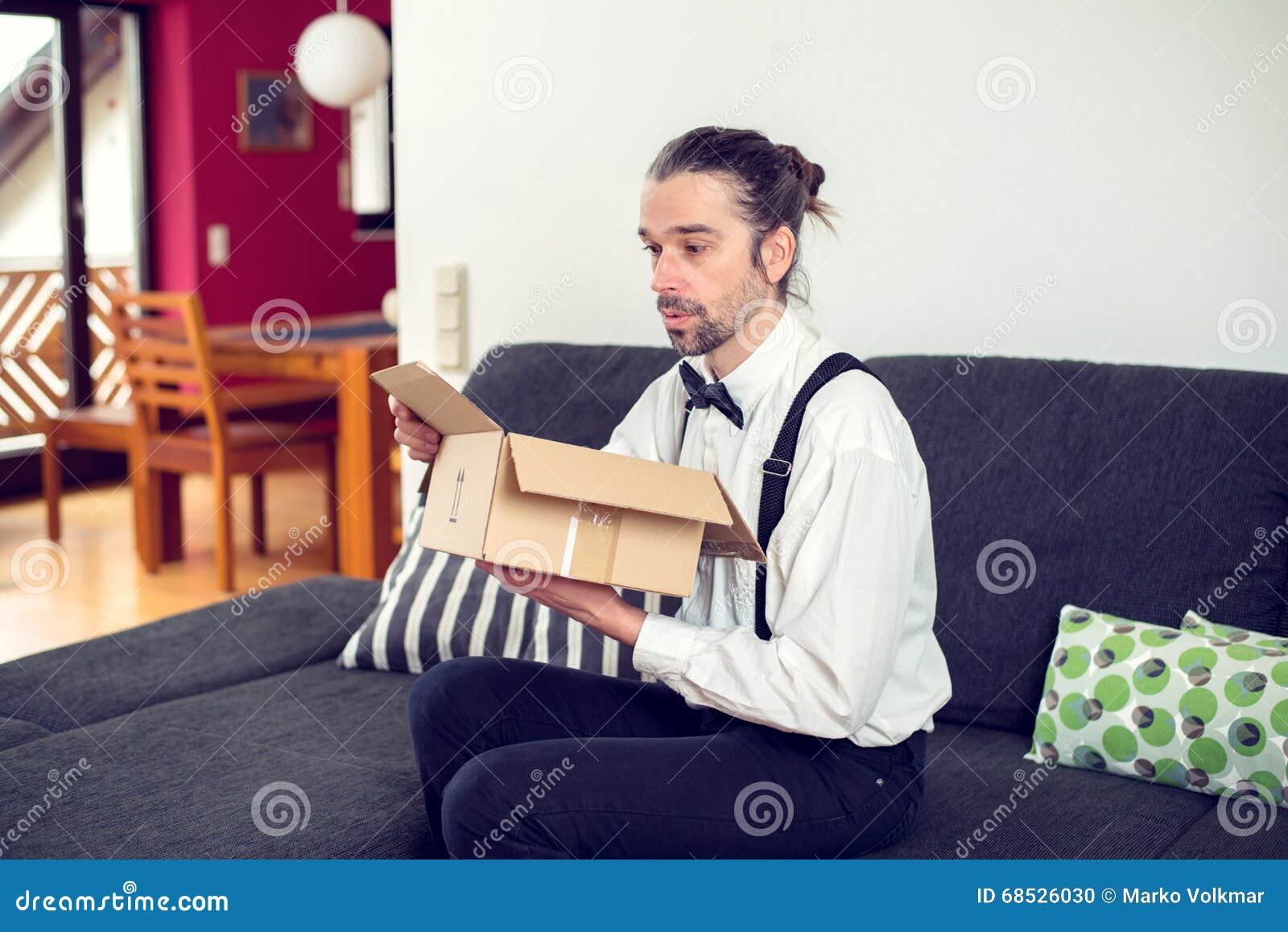 Man opening a package stock photo. Image of opening, surprise - 68526030