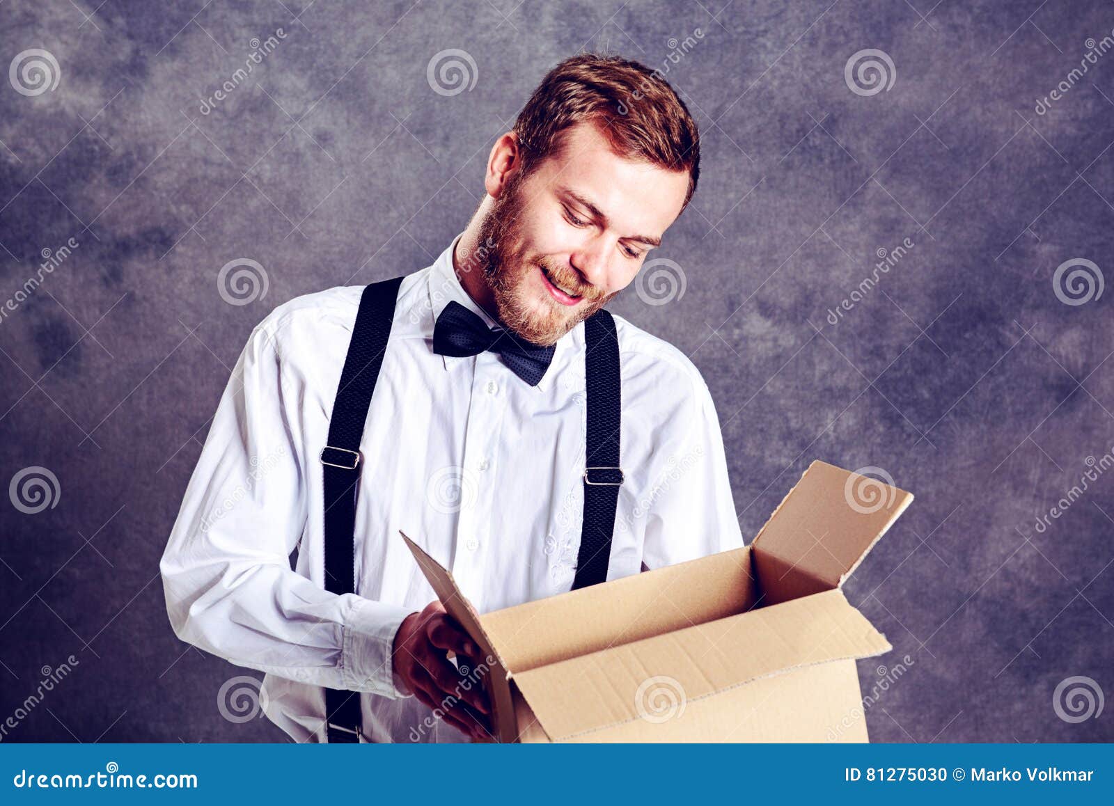 Man opening a package stock photo. Image of background - 81275030