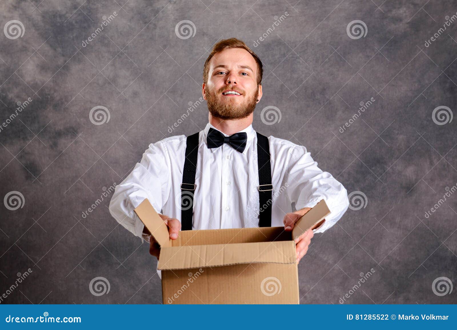 Man opening a package stock photo. Image of surprise - 81285522