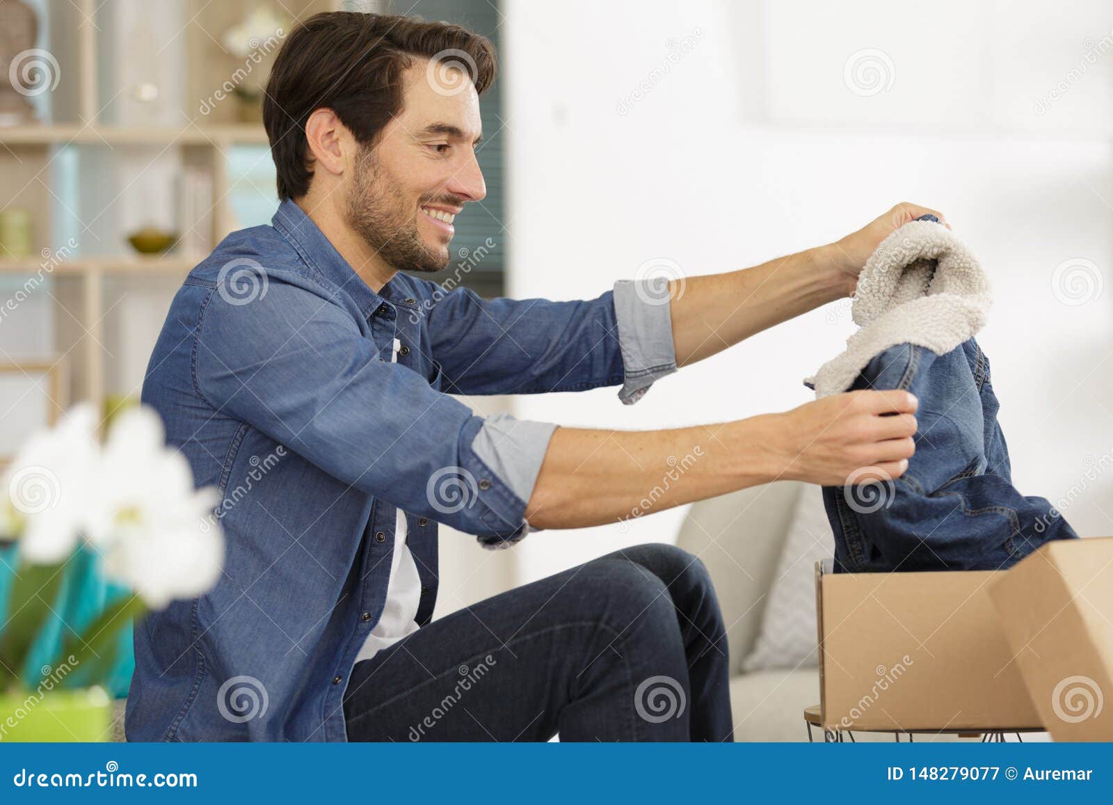 Man opening a parcel stock image. Image of gift, fragile - 148279077