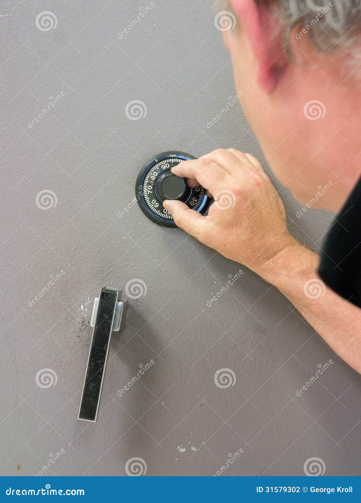A man opening a safe stock photo. Image of invulnerable - 31579302