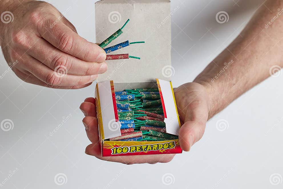 A Man Opens a Box of Firecrackers Stock Photo - Image of firecrackers ...
