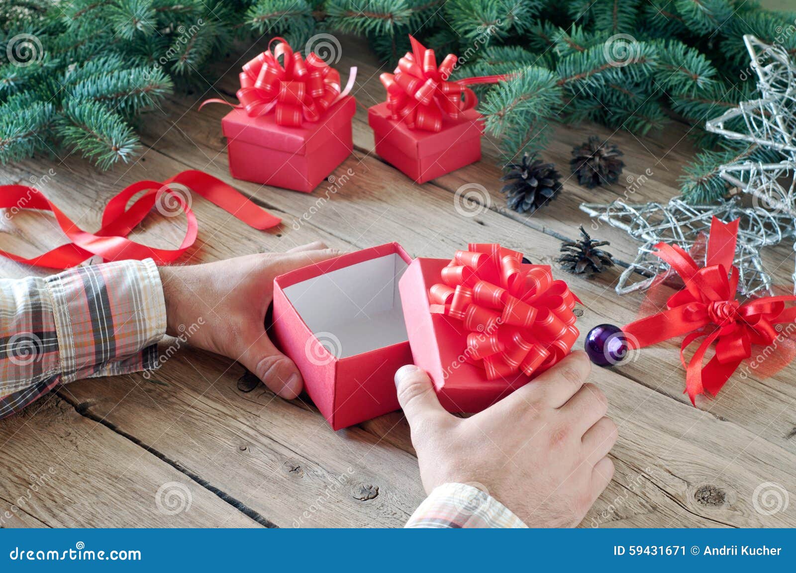 Man Opens Christmas Gift Close Up Stock Photos - Free & Royalty-Free ...
