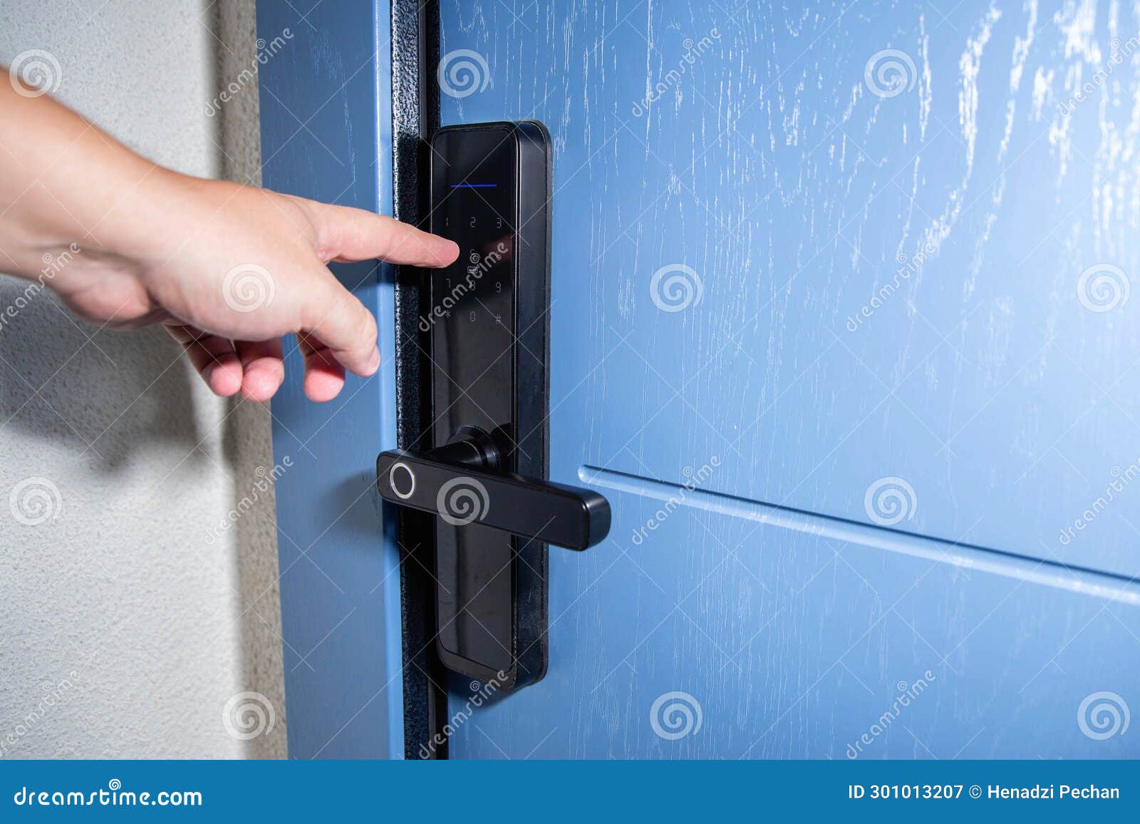 A Man Opens a Door with an Electronic Lock Using an Access Password ...