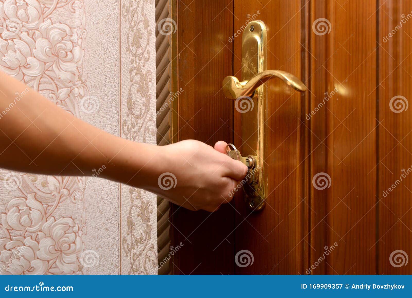 A Man Opens the Front Door by Turning the Handle and Opening the Lock ...