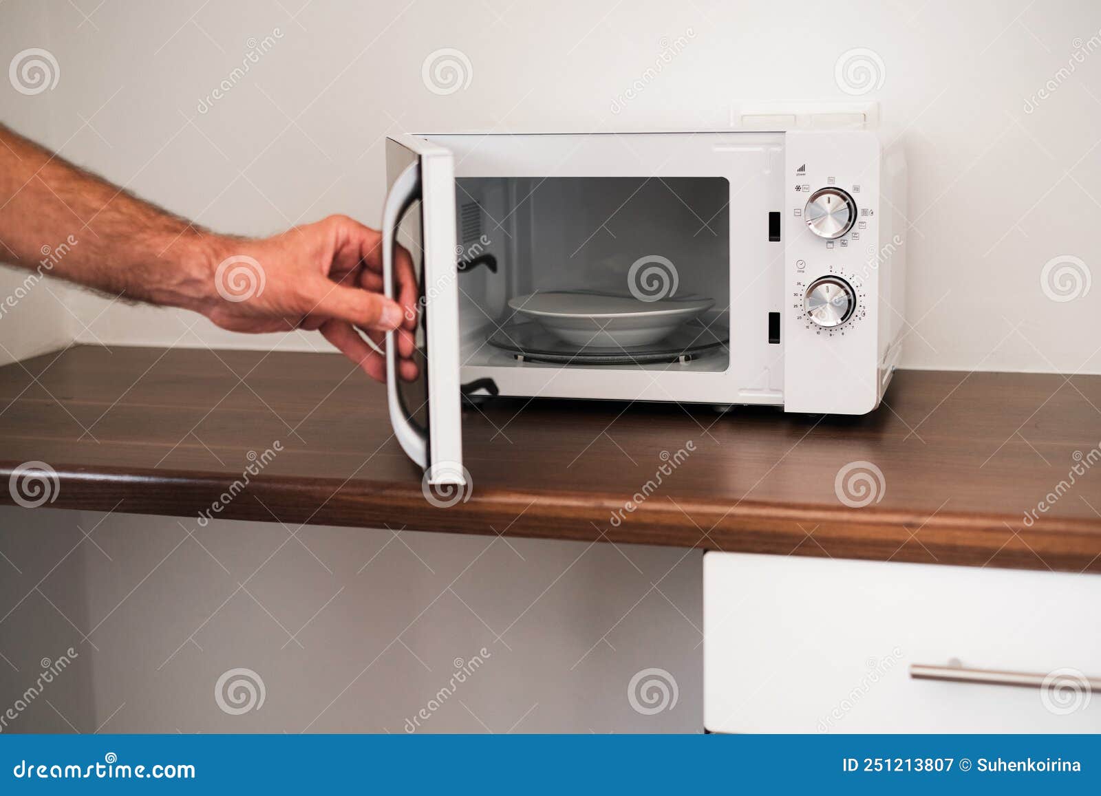 Man Opens Microwave To Get His Plate of Food Stock Image - Image of ...