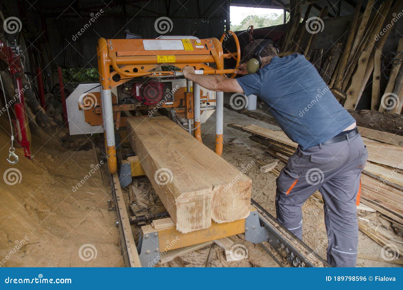 Man Operates a Log Band Saw. in a Hall Editorial Photo - Image of ...