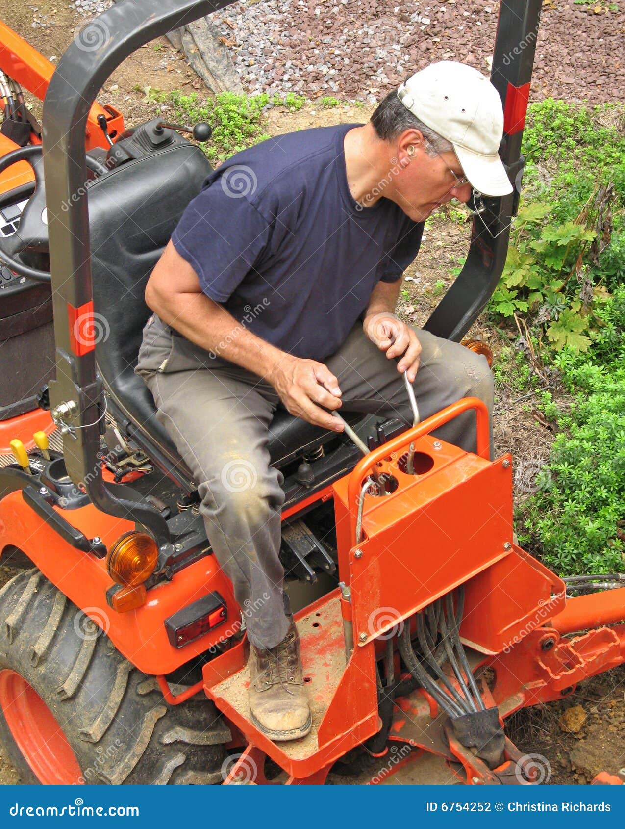 Man operating backhoe stock photo. Image of work, equipment - 6754252