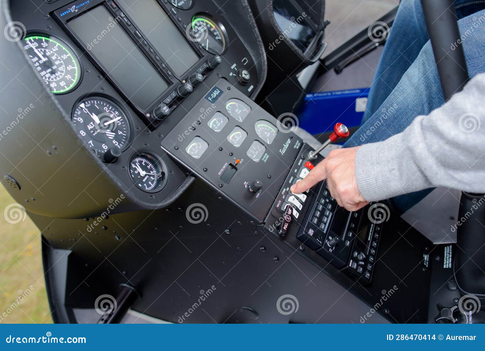 Man Operating Controls in Cockpit Stock Photo - Image of controls ...