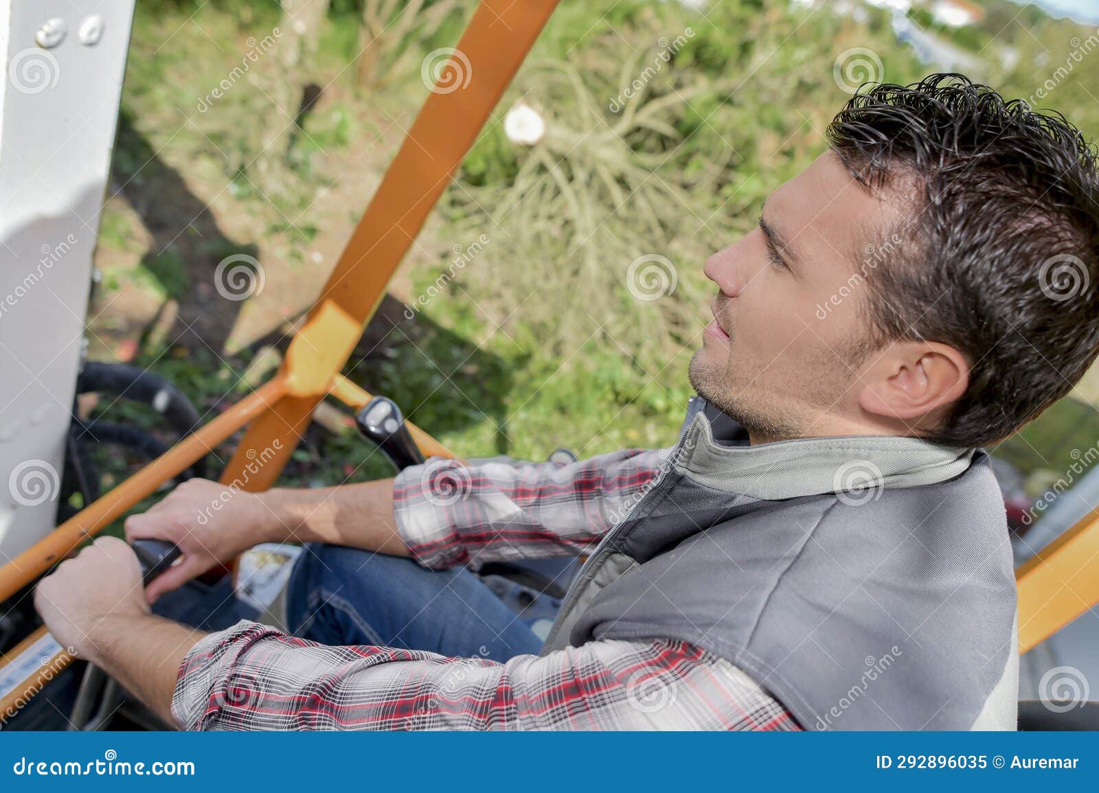 Man operating digger stock image. Image of equipment - 292896035
