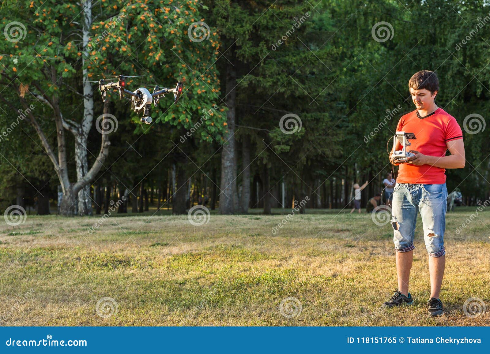 Ufa, Russia. - 8 August 2016 : Man Operating Drone Flying or Hovering ...