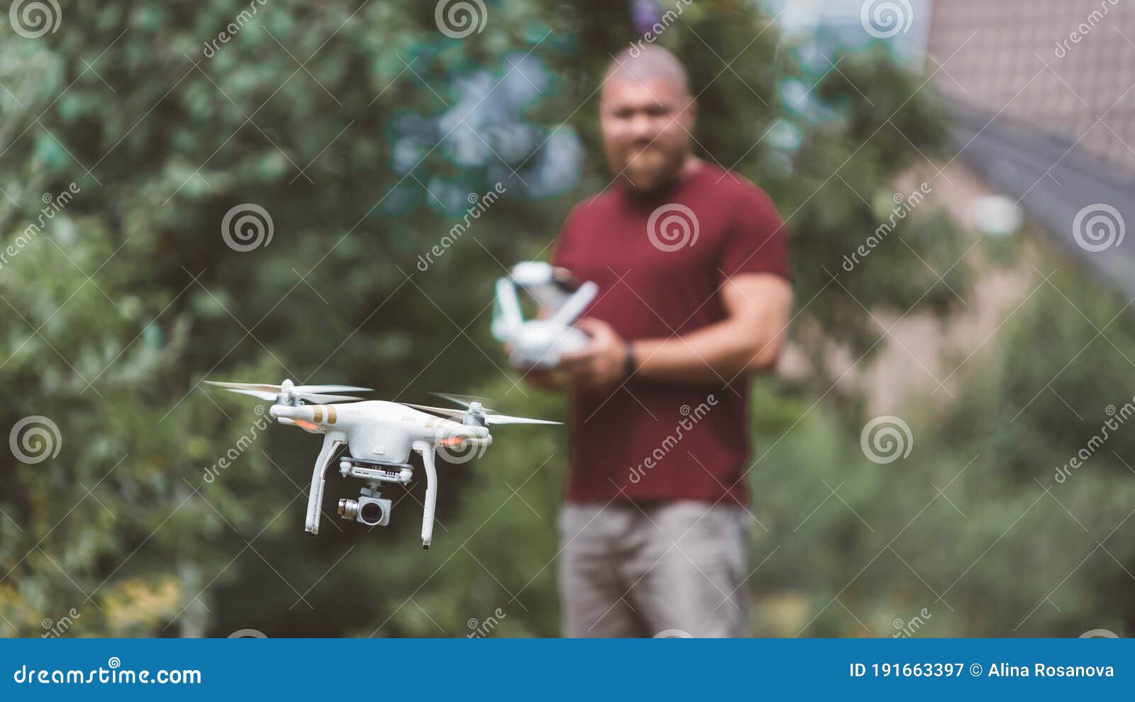 Man Operating A Drone With Remote Control Stock Image Image Of