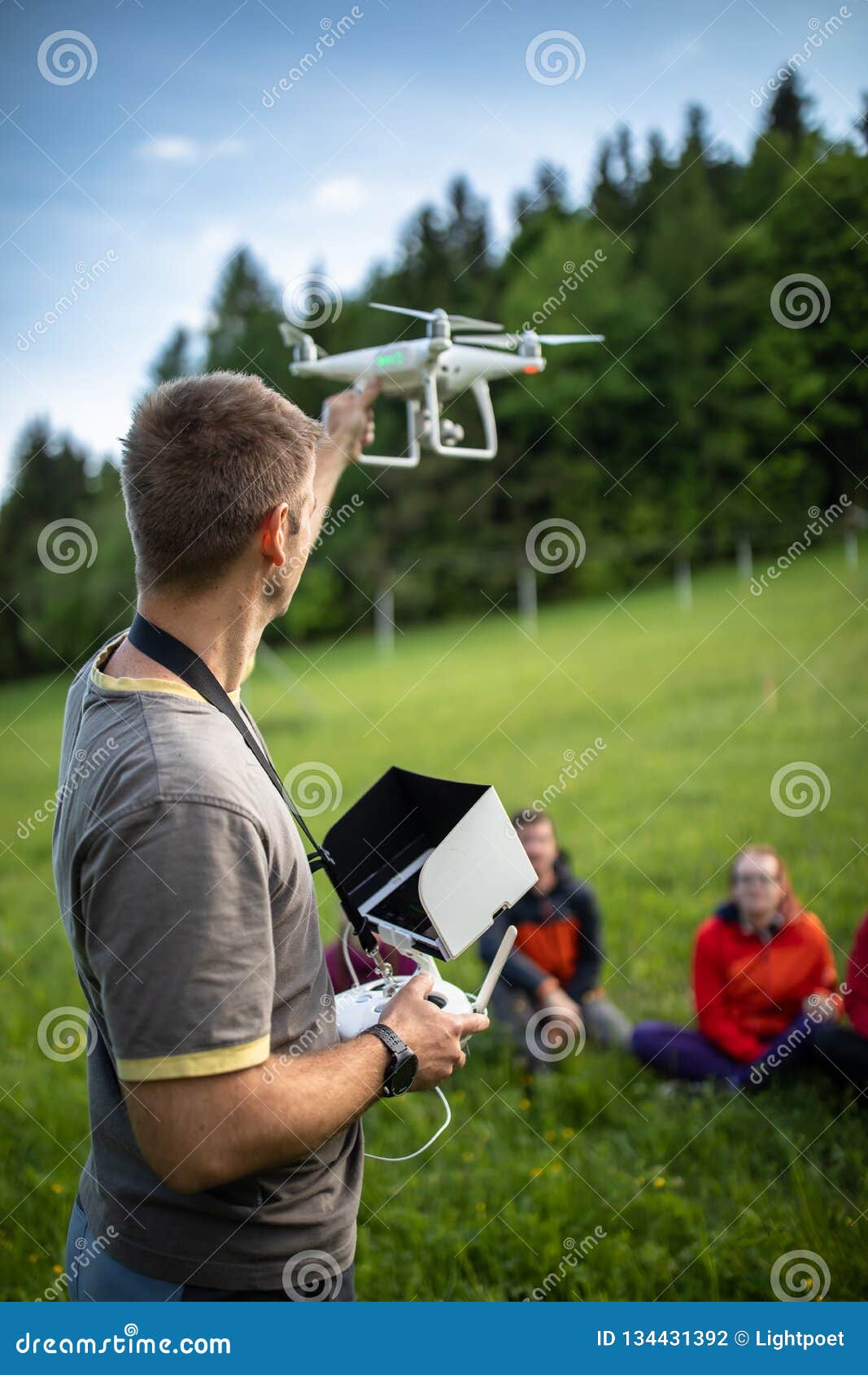 Man Operating a Drone by a Remote Control Stock Photo - Image of ...