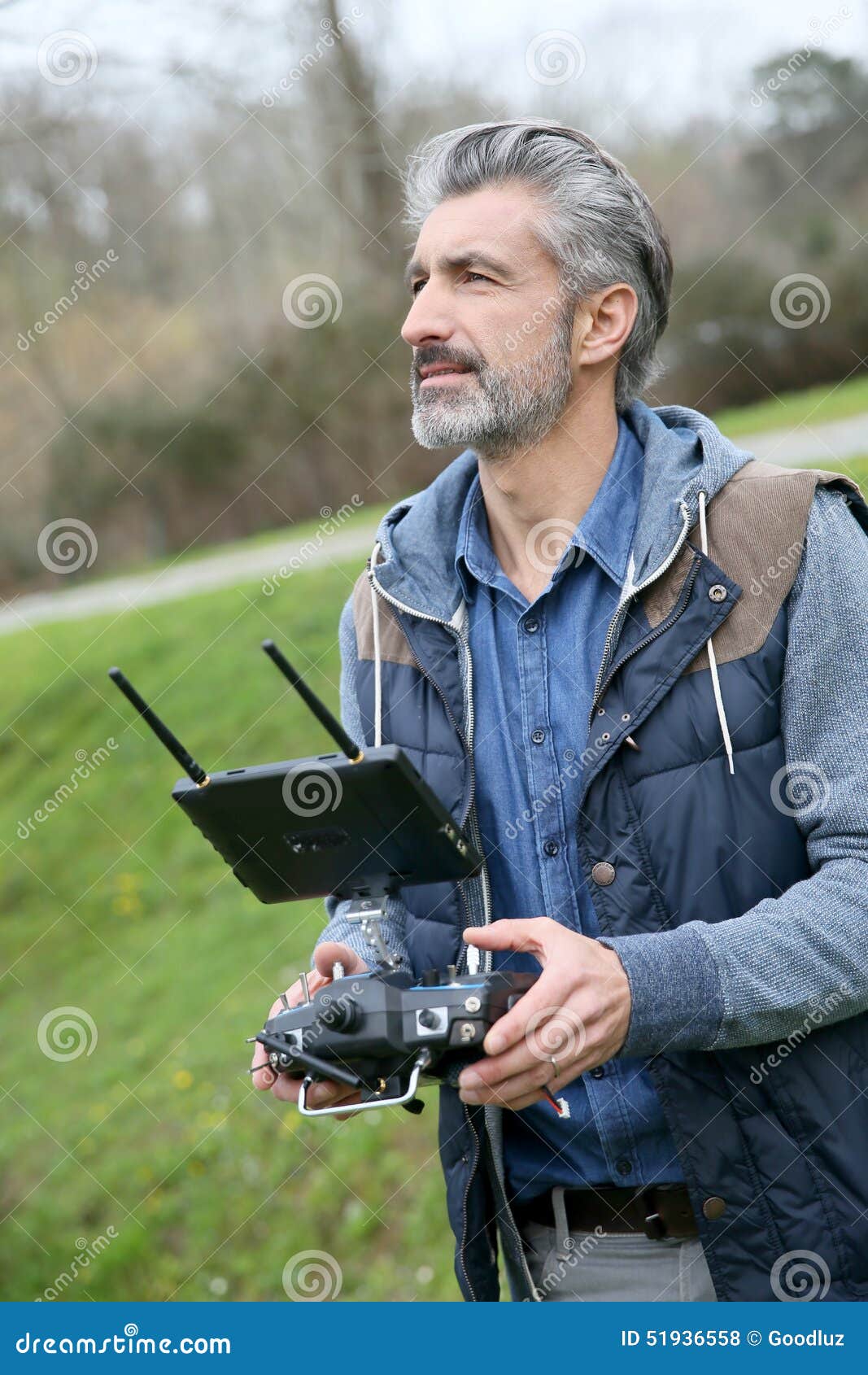 Man Operating a Drone with Remote Control Outdoors Stock Photo - Image ...