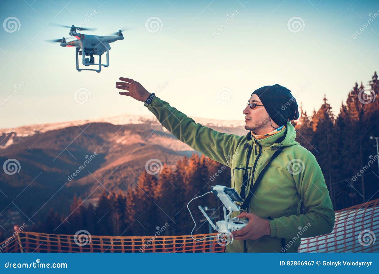 Man operating a drone stock image. Image of forest, outdoors - 82866967