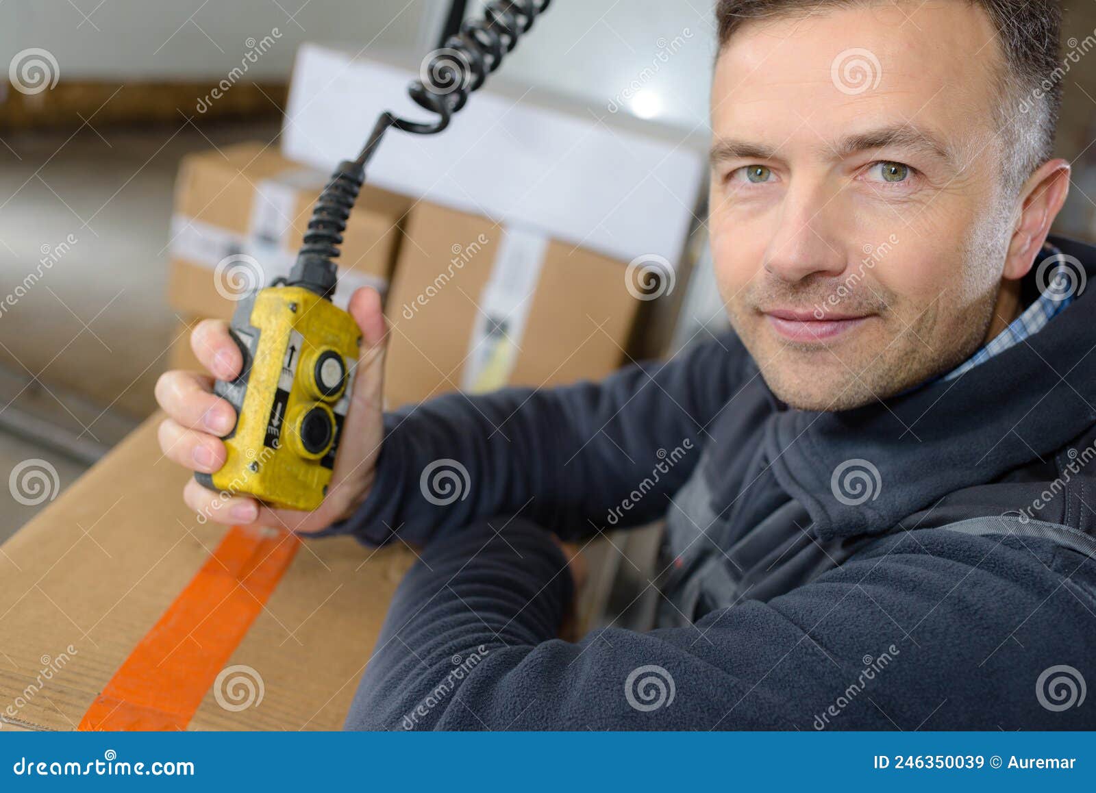 Man operating elevator stock image. Image of middleaged - 246350039