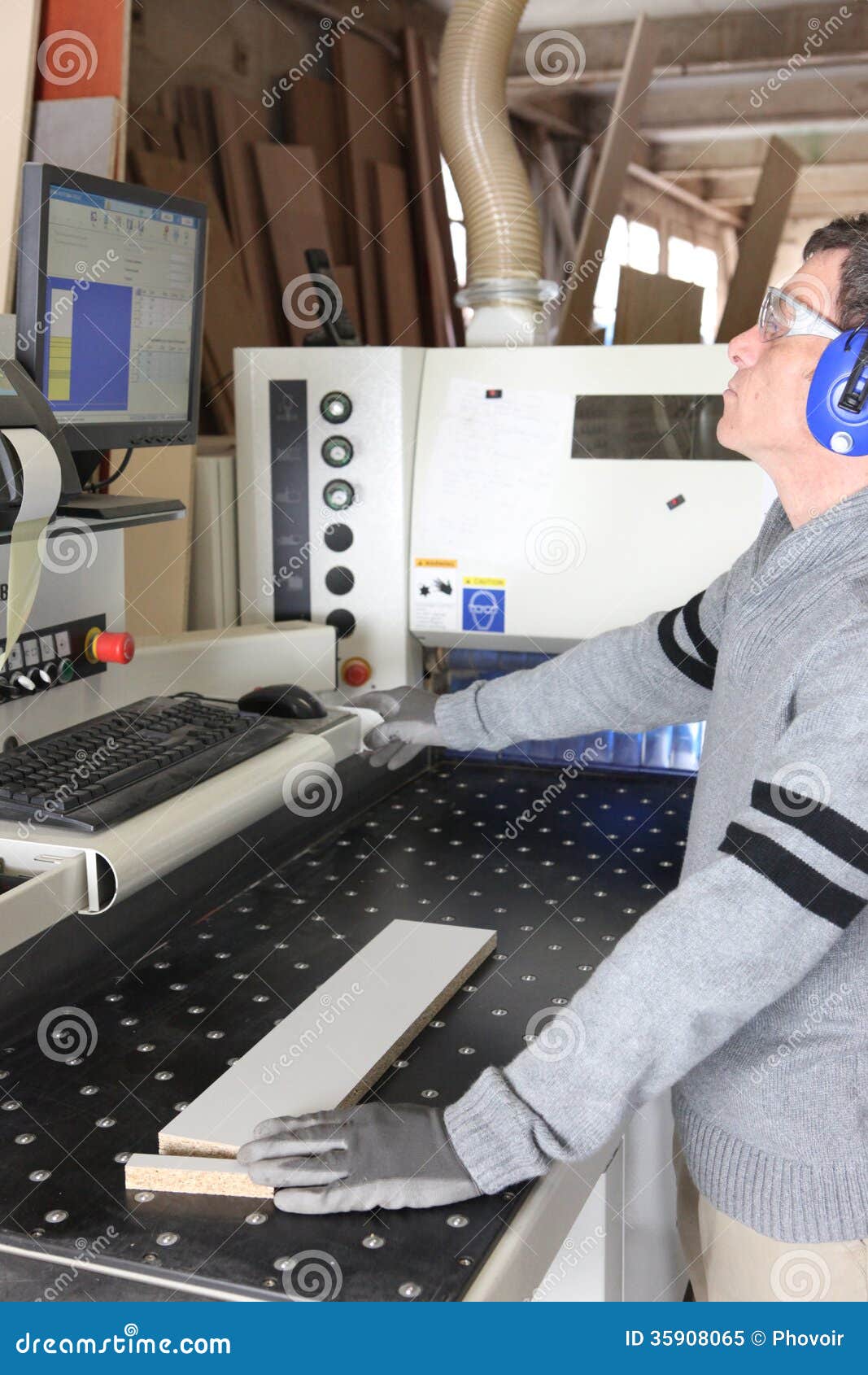 Man operating factory saw stock image. Image of drill - 35908065