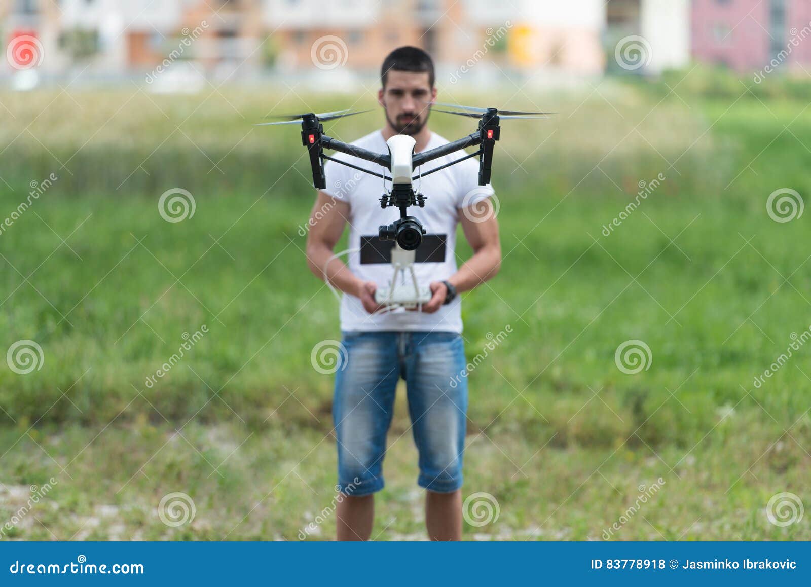 Man Operating a Flying Drone in the Sky Stock Photo - Image of person ...
