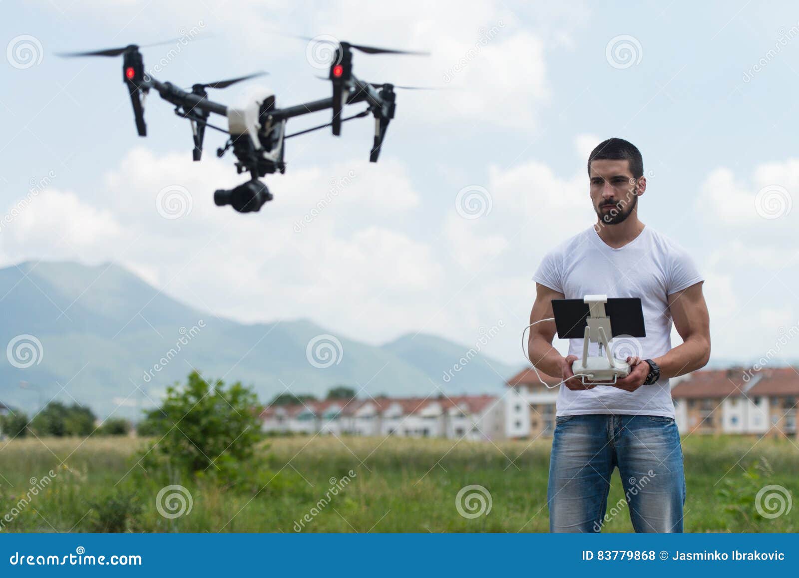 Man Operating a Flying Drone in the Sky Stock Photo - Image of aircraft ...