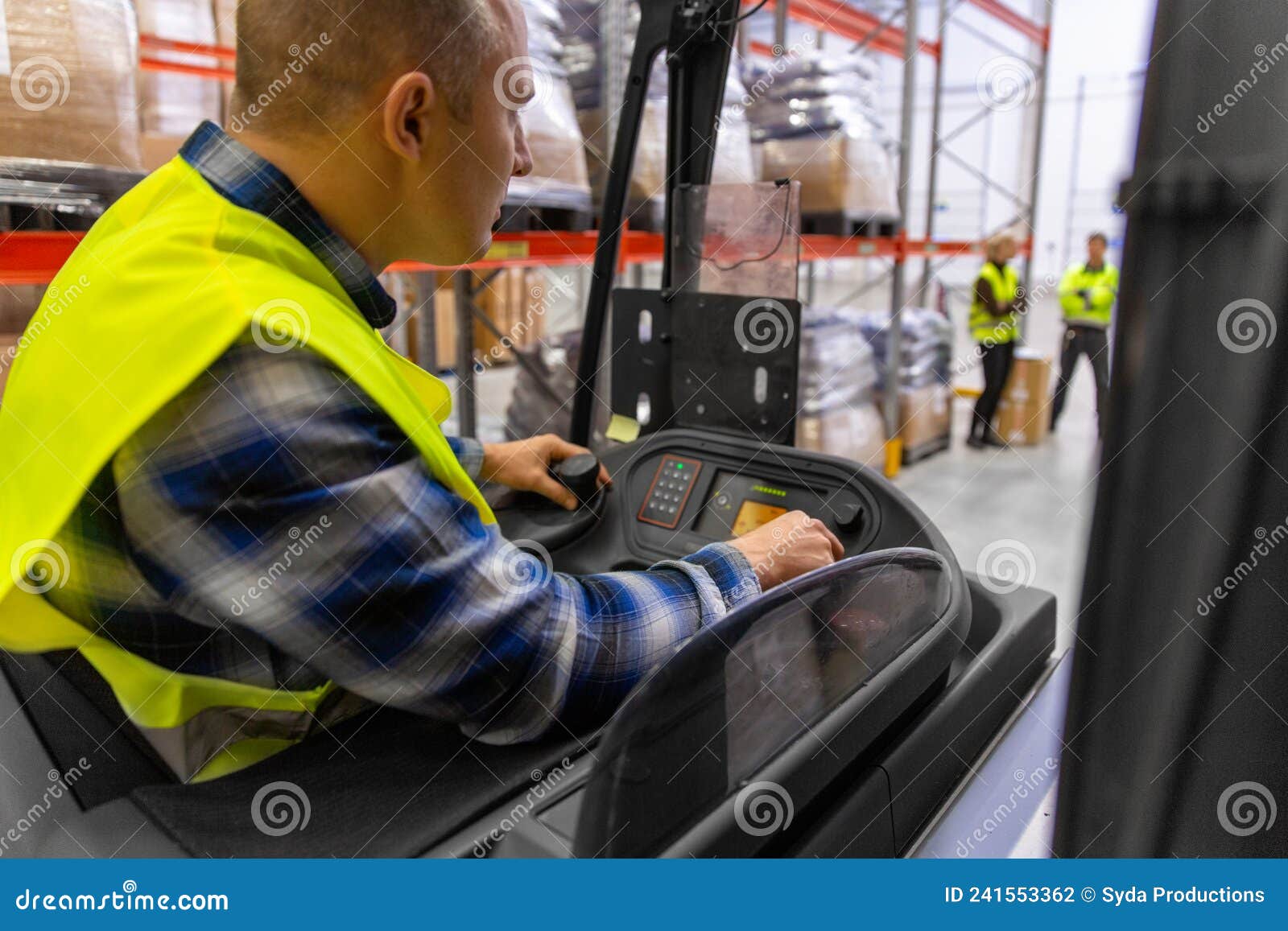 Man Operating Forklift Loader at Warehouse Stock Photo - Image of ...