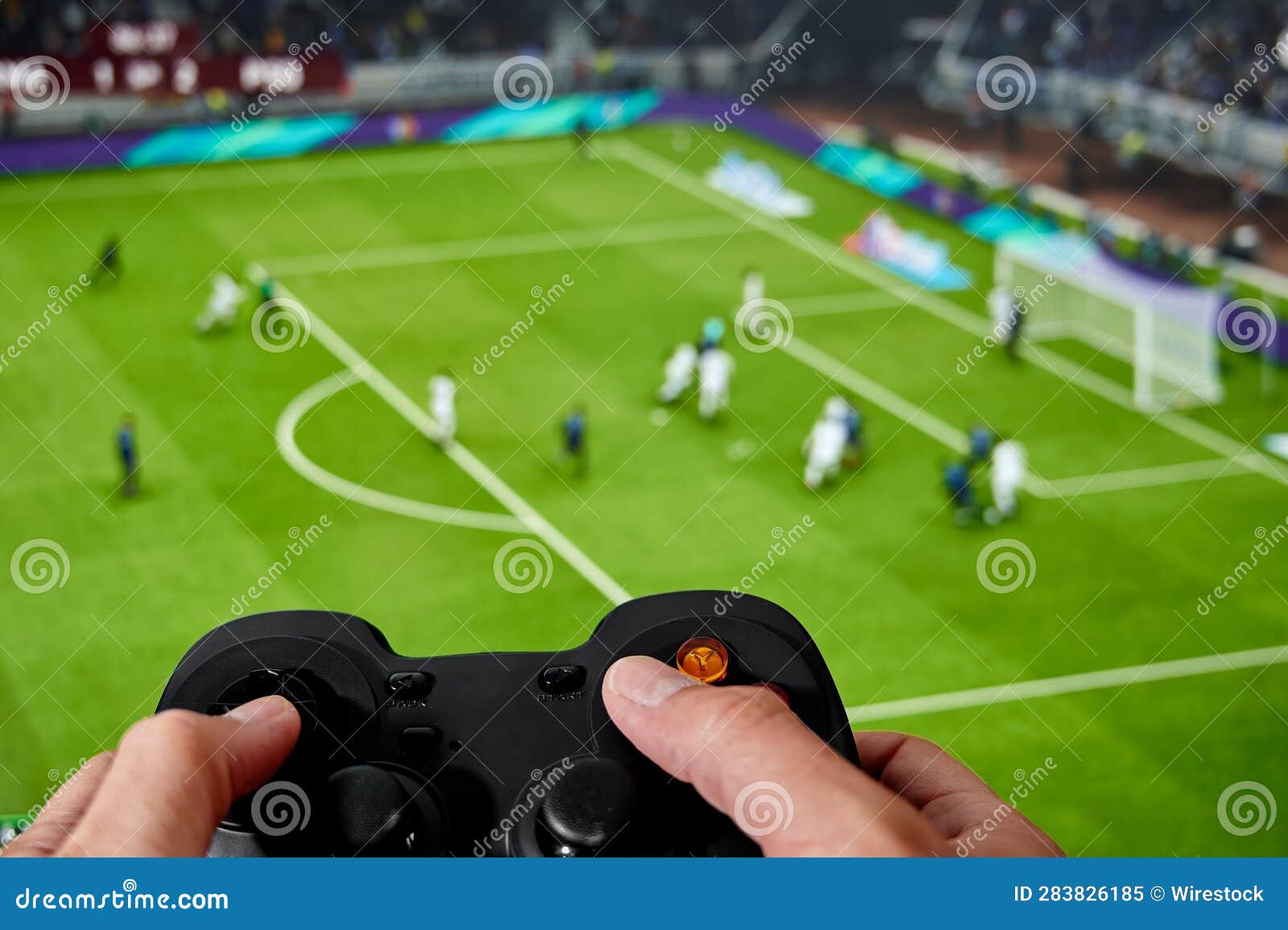 Man Operating a Game Controller in Front of a Screen Stock Image ...