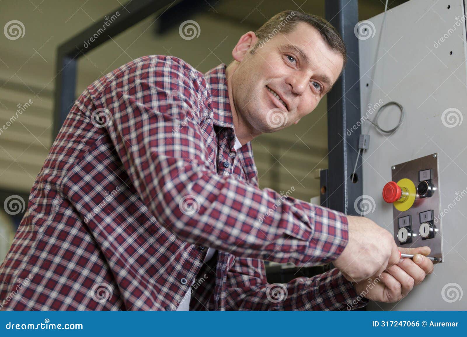 Man Operating Machine in Factory Stock Photo - Image of operating, male ...