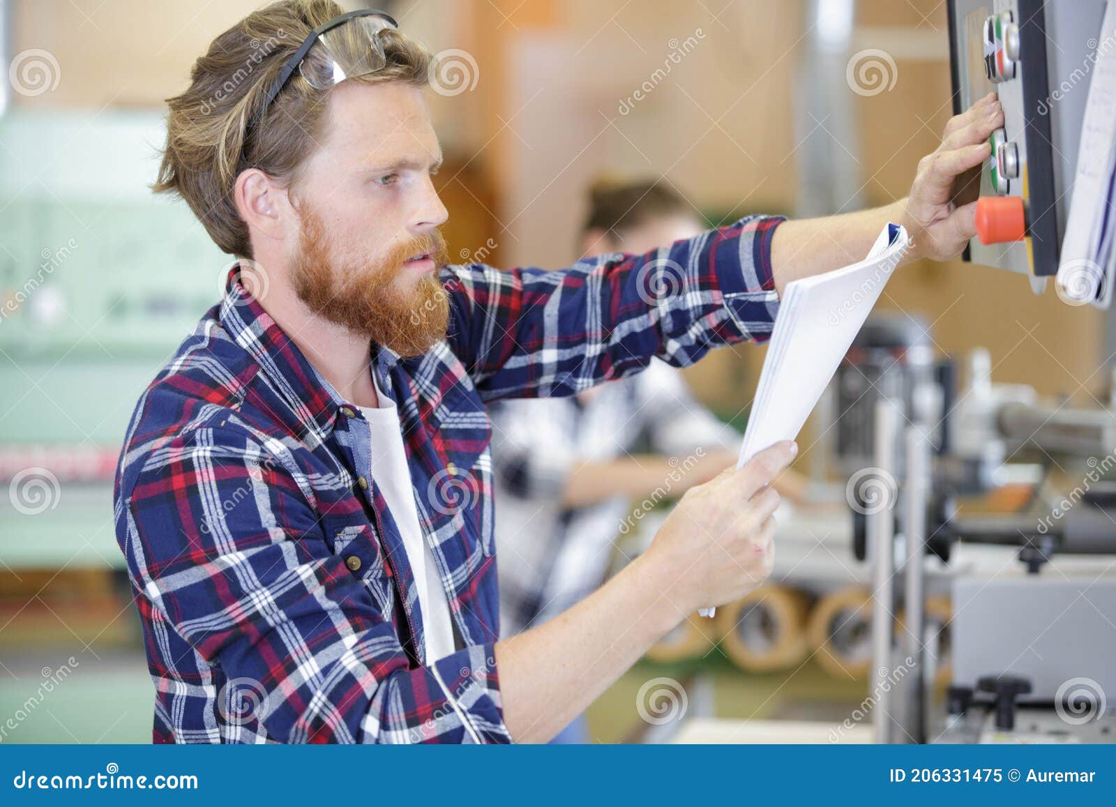 Man operating machine stock image. Image of roll ...