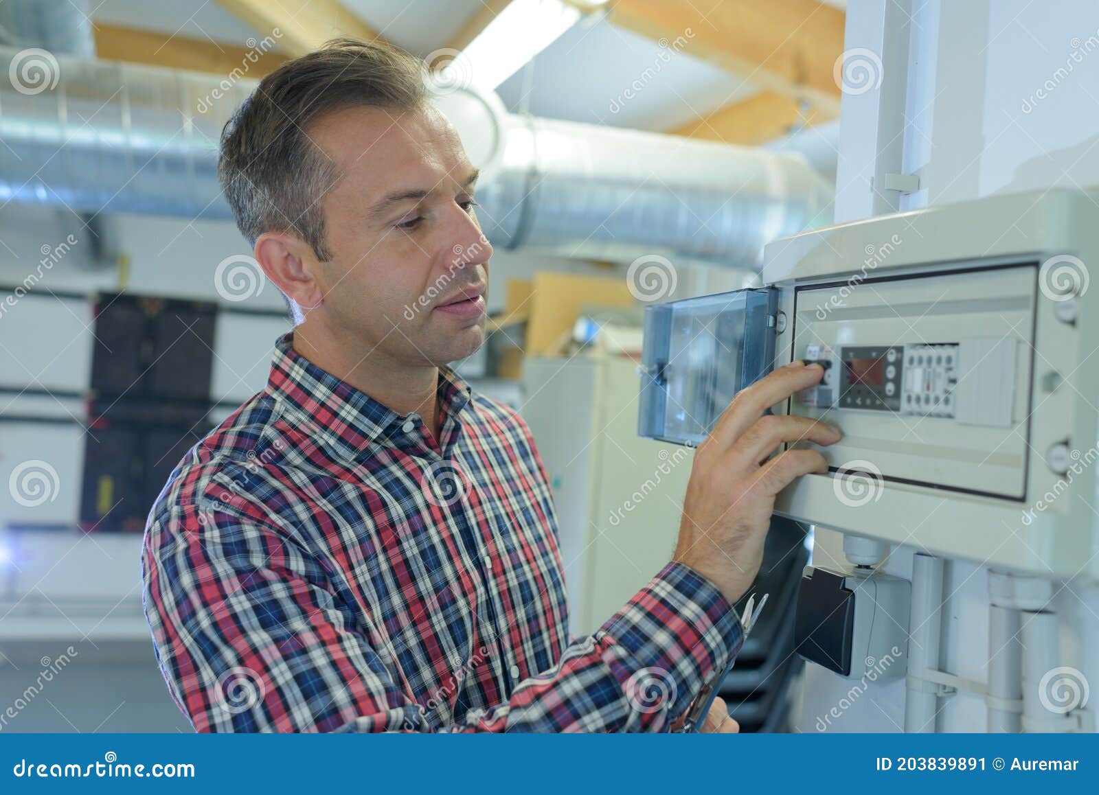Man Operating Machine Units in Modern Factory Stock Image - Image of ...