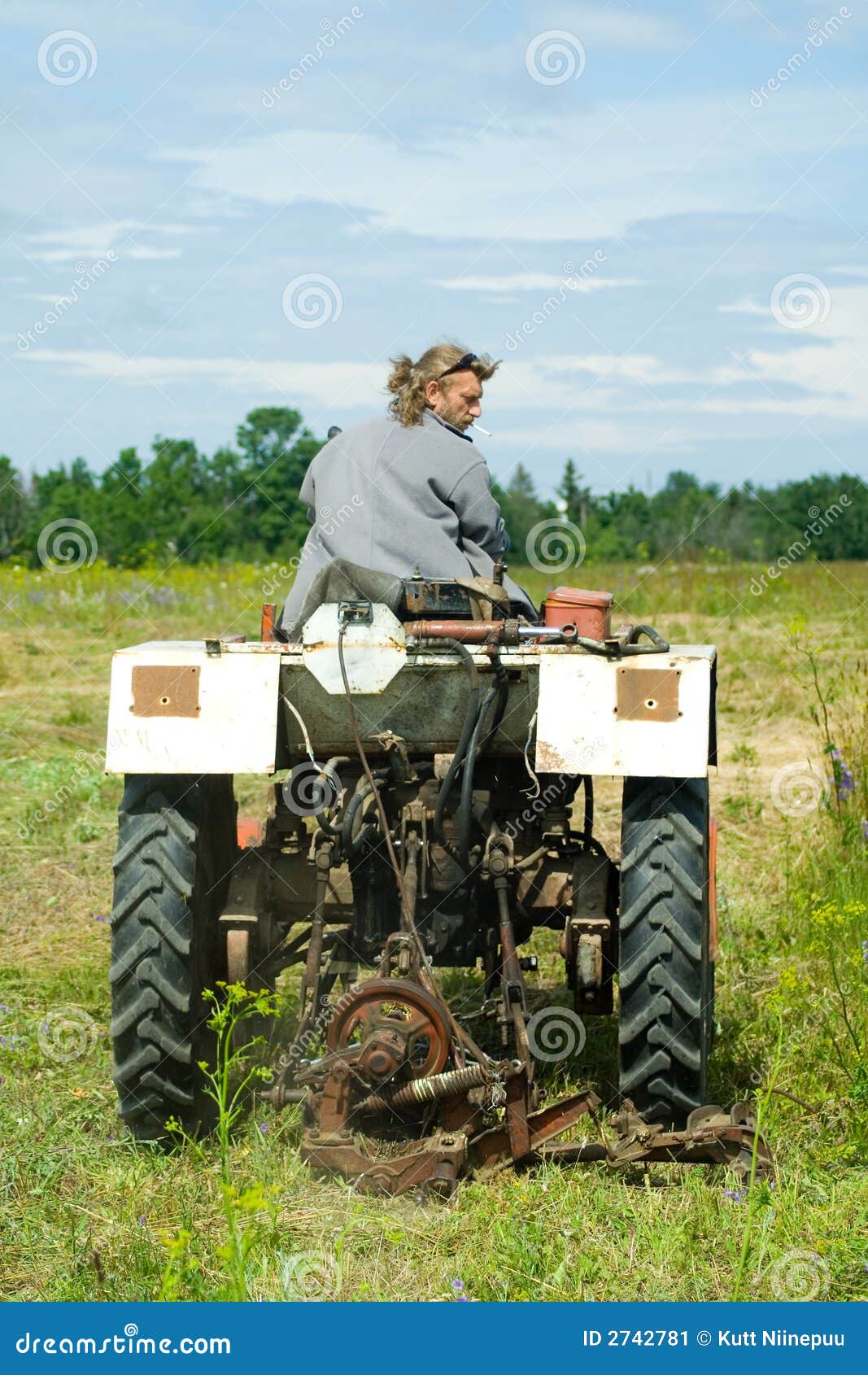 Man operating a tractor stock image. Image of farmer, wheels - 2742781