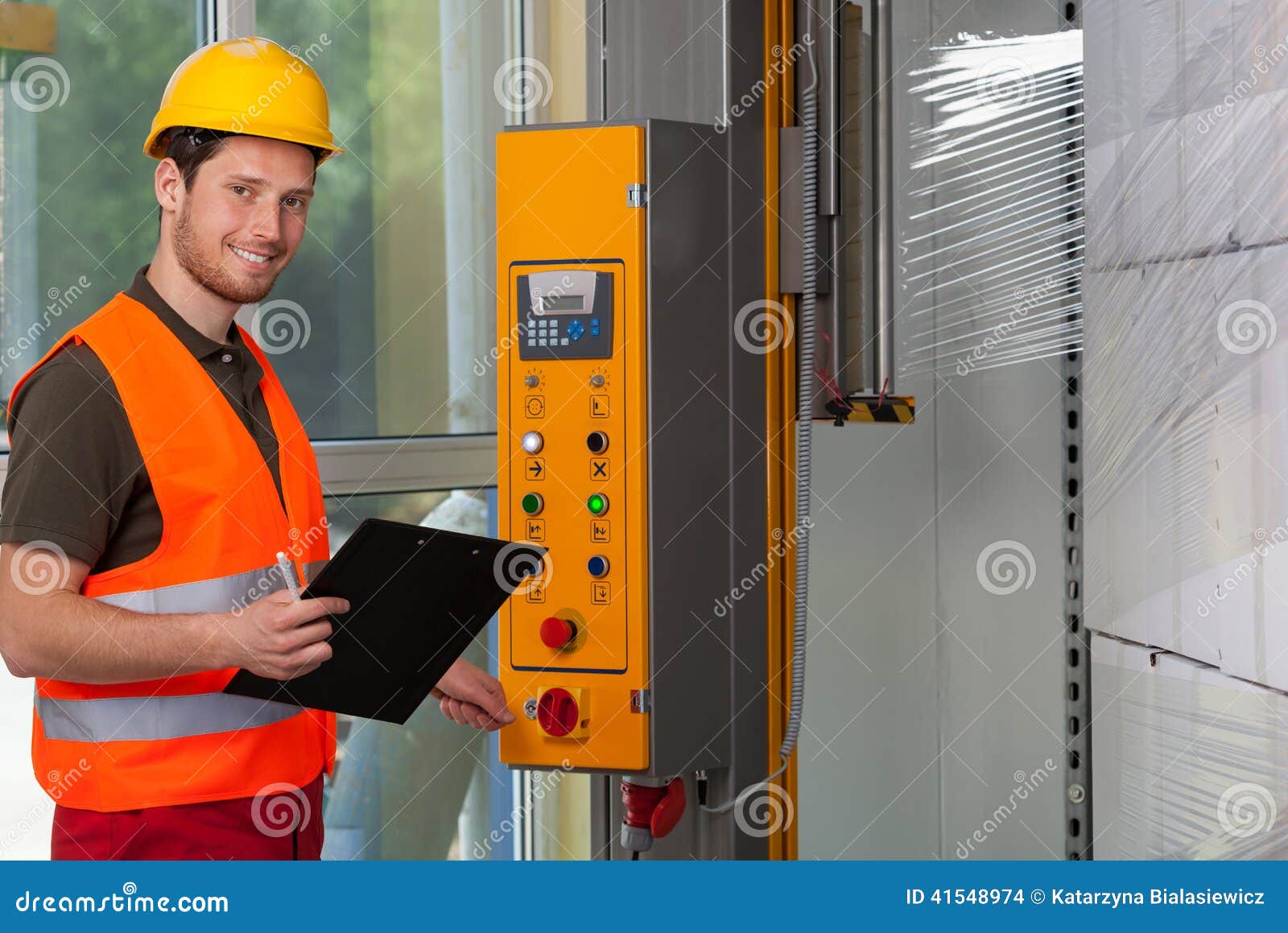 Man Operating a Wrapping Machine Stock Photo - Image of safety, operate ...